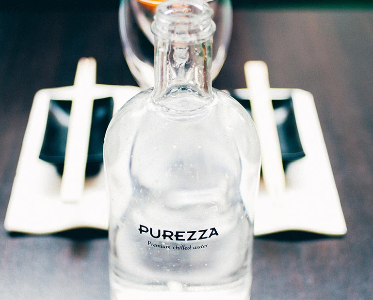 Premium kaldt og kullsyreholdig drikkevann · Purezza